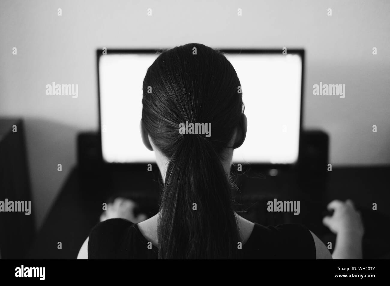 Woman and computer and rear view Black and White Stock Photos & Images ...