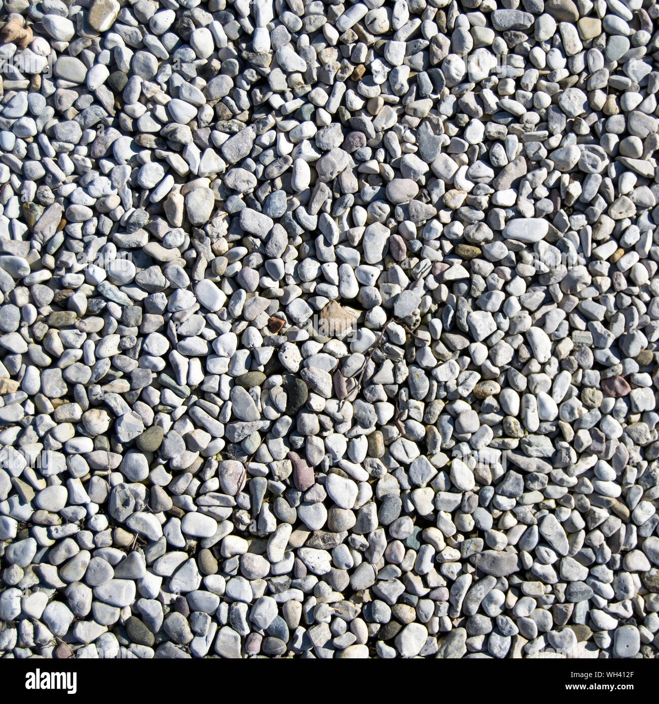 Gray pebbles texture Stock Photo - Alamy