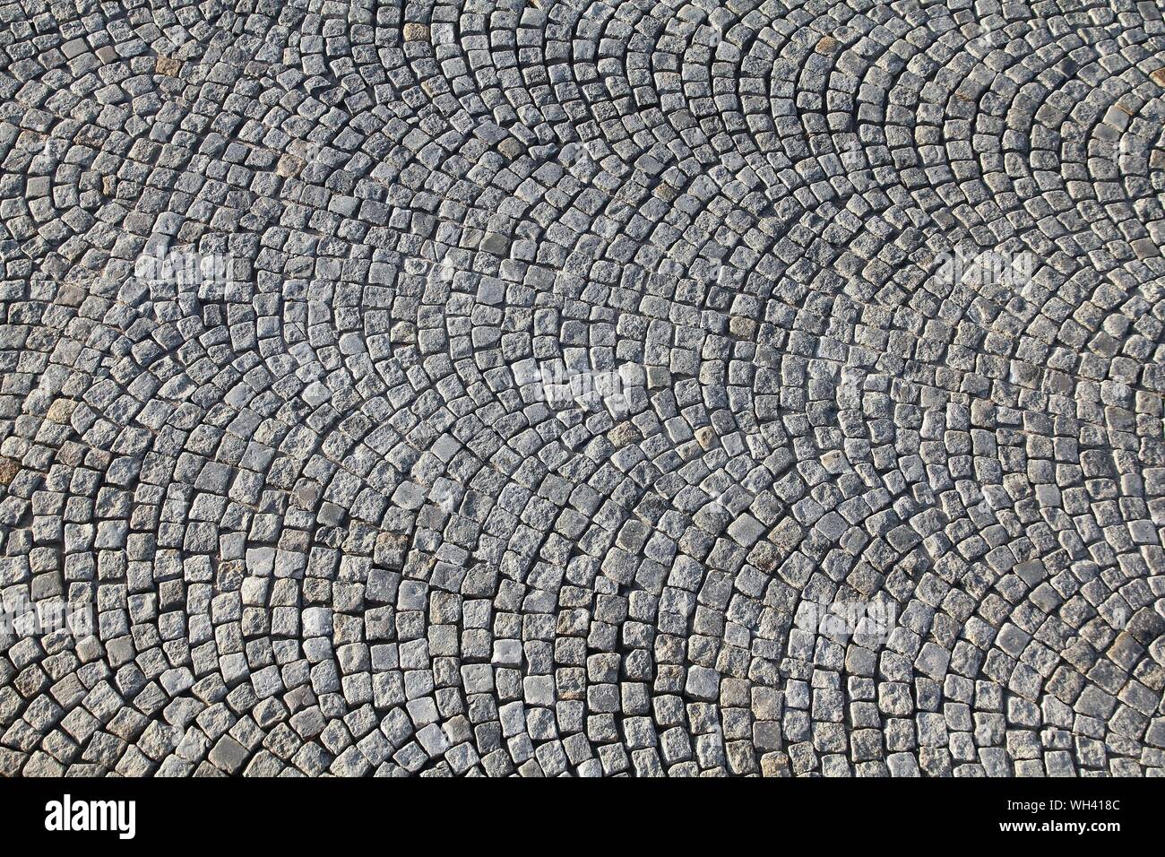 Cobblestone background texture. Cobbled square in Warsaw, Poland Stock ...