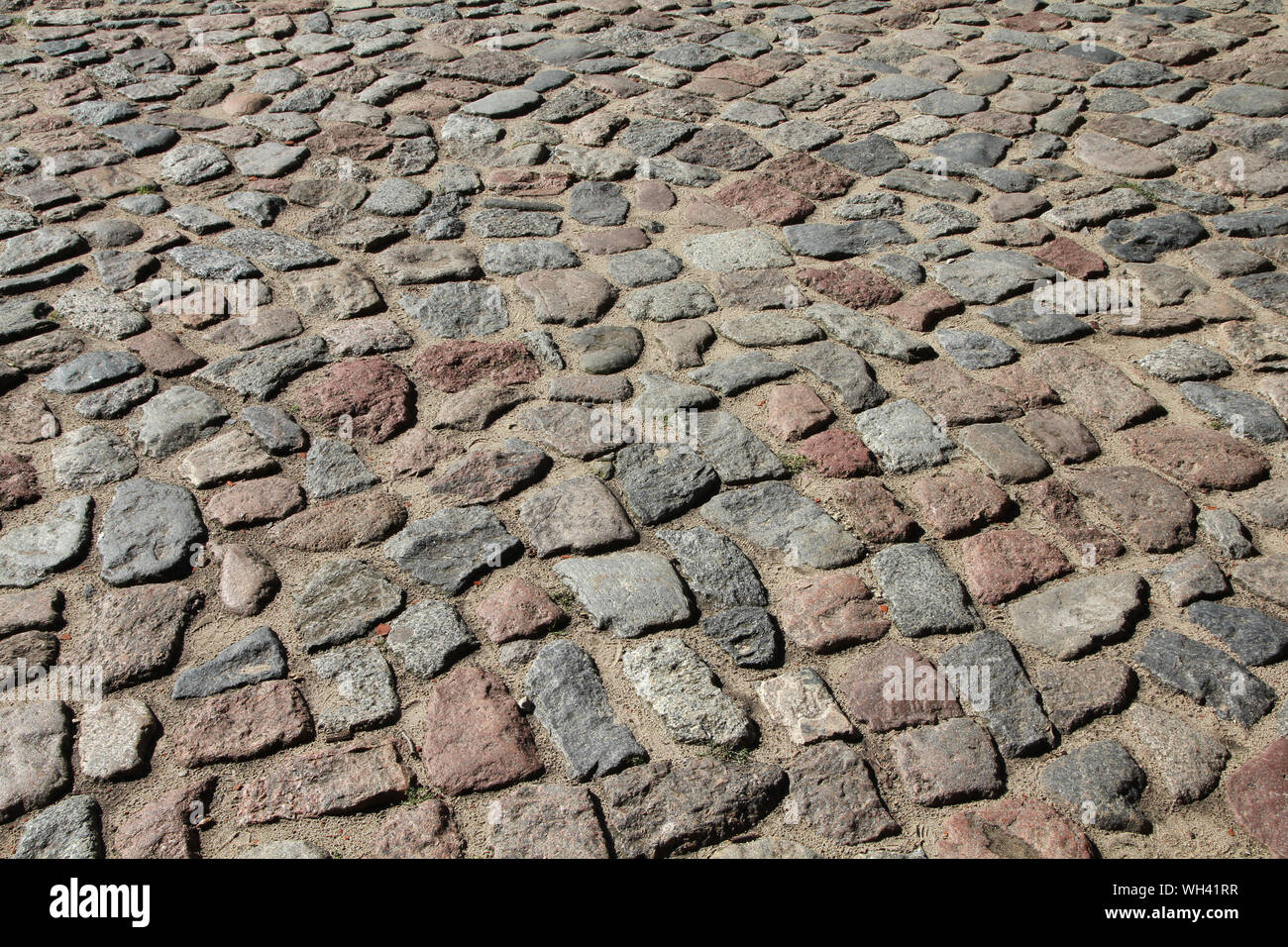 Cobblestone background texture. Cobbled square in Malbork castle ...