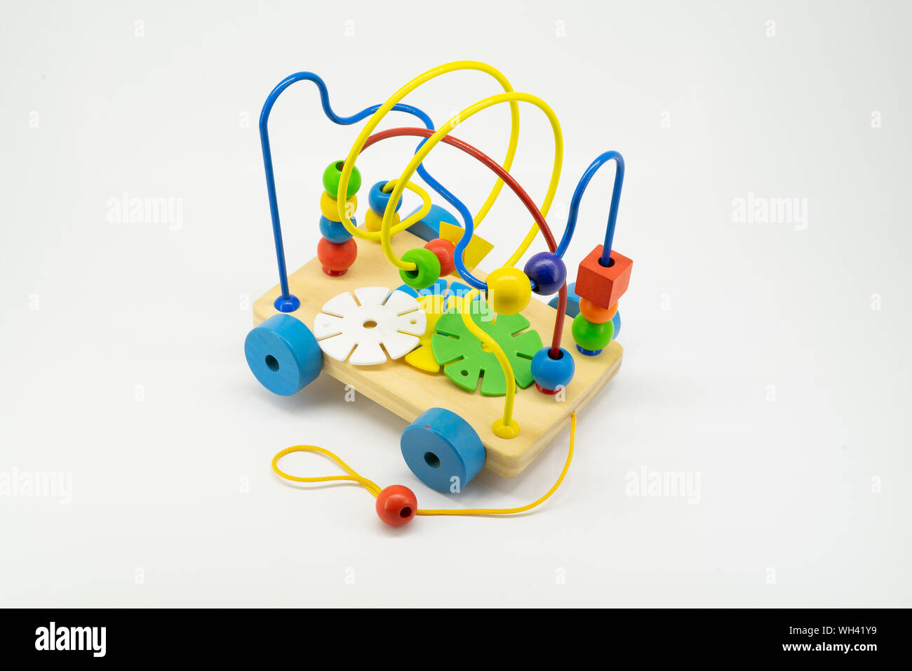 Colourful wooden toy car with string puller isolated on white ...
