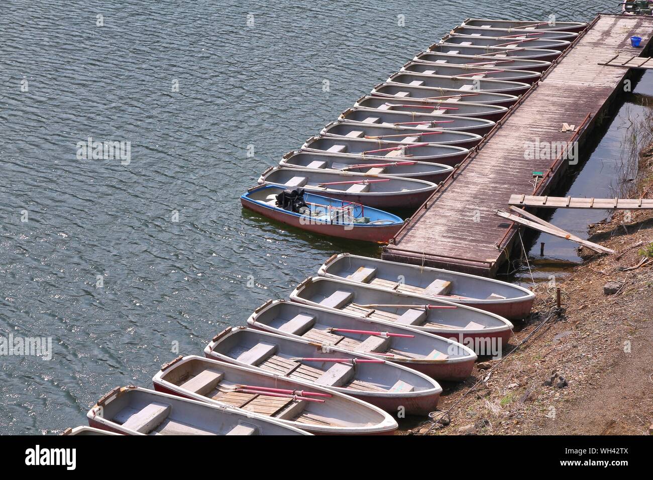 Fishing boats - vessels at a pier in Lake Shojiko, Japan Stock Photo ...