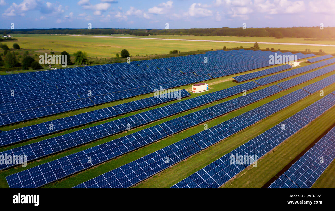 Aerial top view of a solar pannels power plant. Renewable energy ...