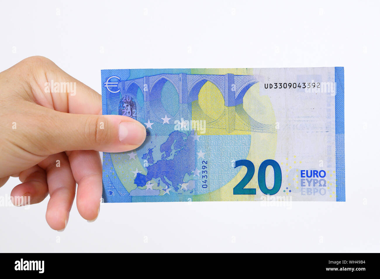 Hand holding note money hi-res stock photography and images - Alamy