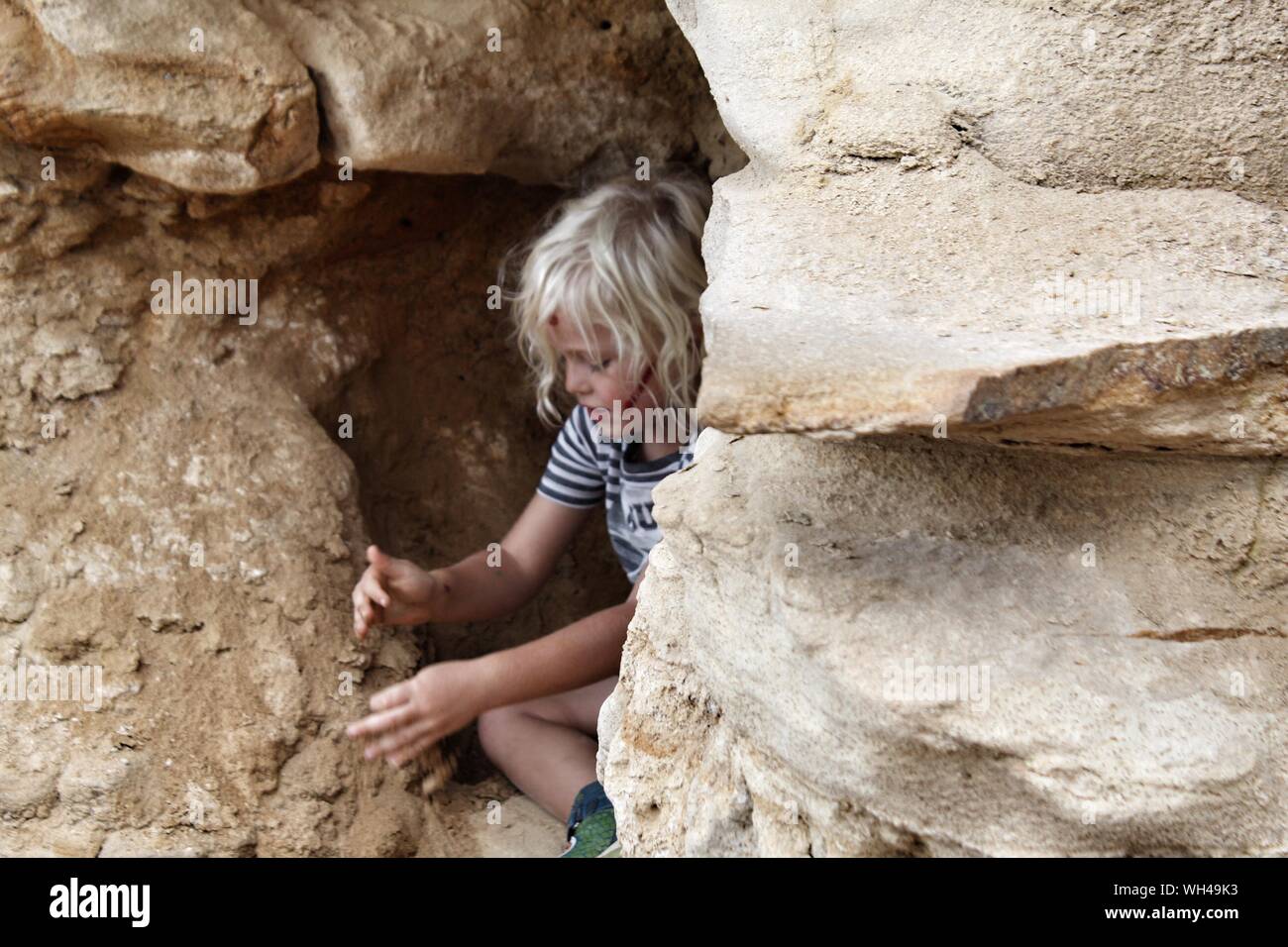 Boy in cave hi-res stock photography and images - Alamy