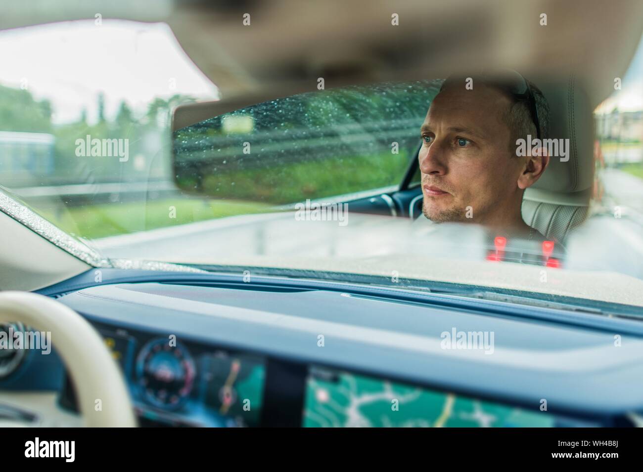 Maximum Attention While Driving. Caucasian Driver in His 40s Fast ...