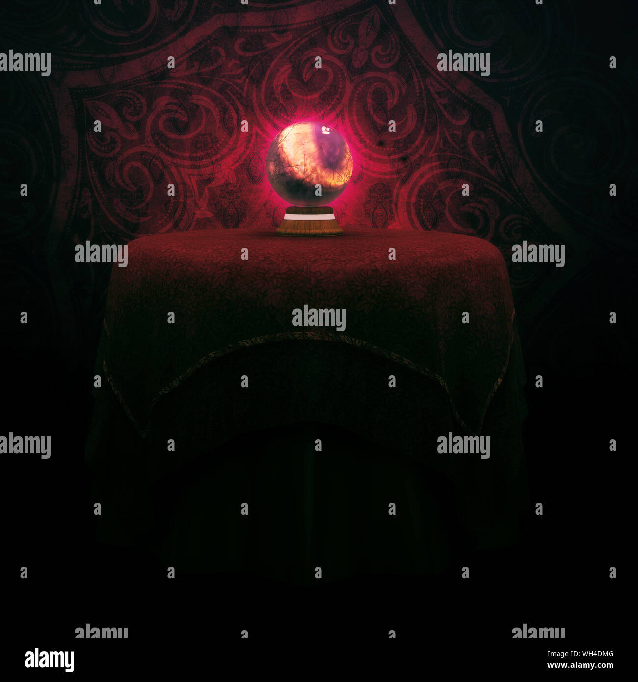 Fantasy magic crystal ball on the table with red cloth Stock Photo - Alamy