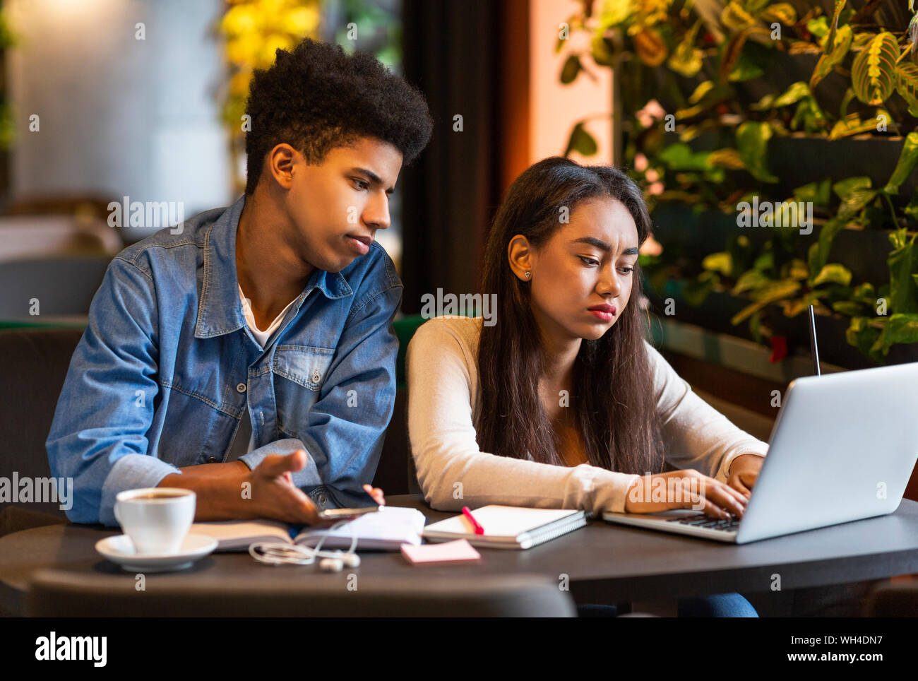 Hardworking students experiencing difficulties while studying at ...