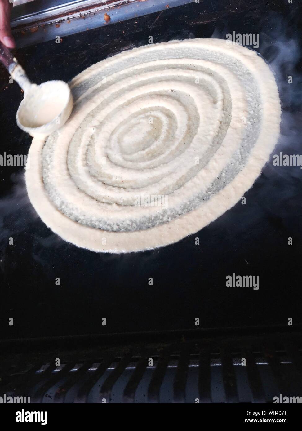 Making Dosa High Resolution Stock Photography and Images - Alamy