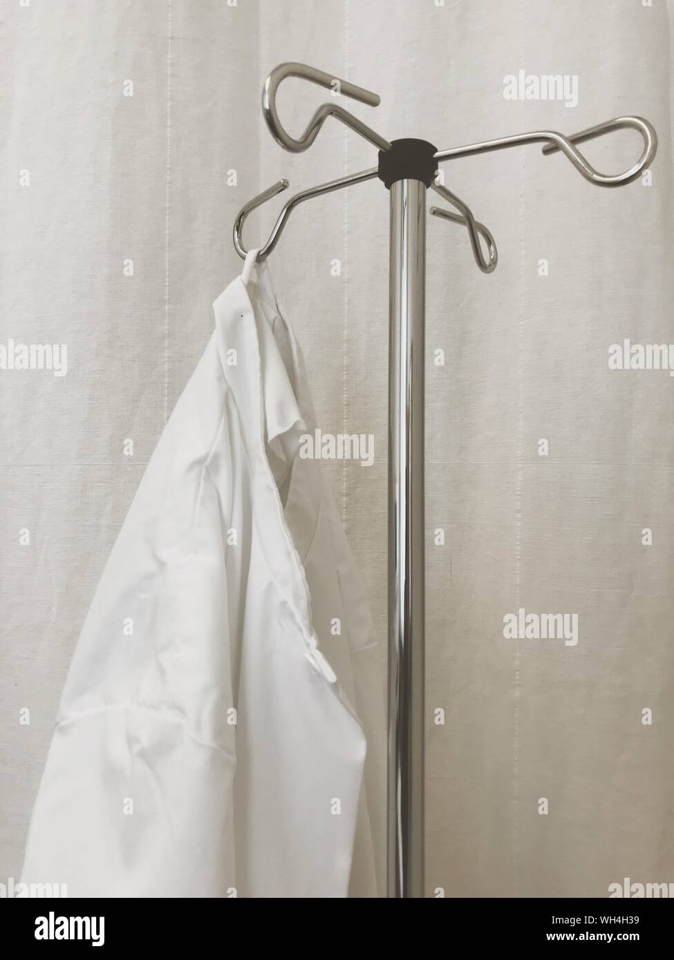 Metal coat rack hi-res stock photography and images - Alamy