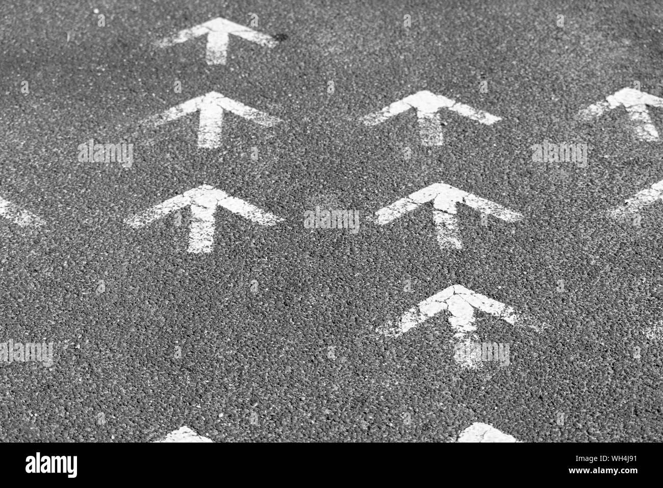 Road marking arrow Black and White Stock Photos & Images - Alamy