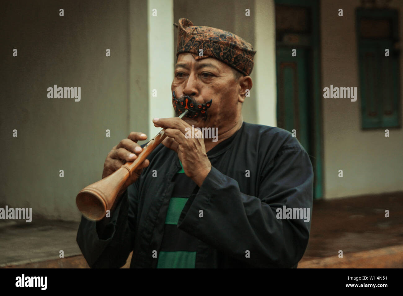 One person playing wind instrument hi-res stock photography and images ...