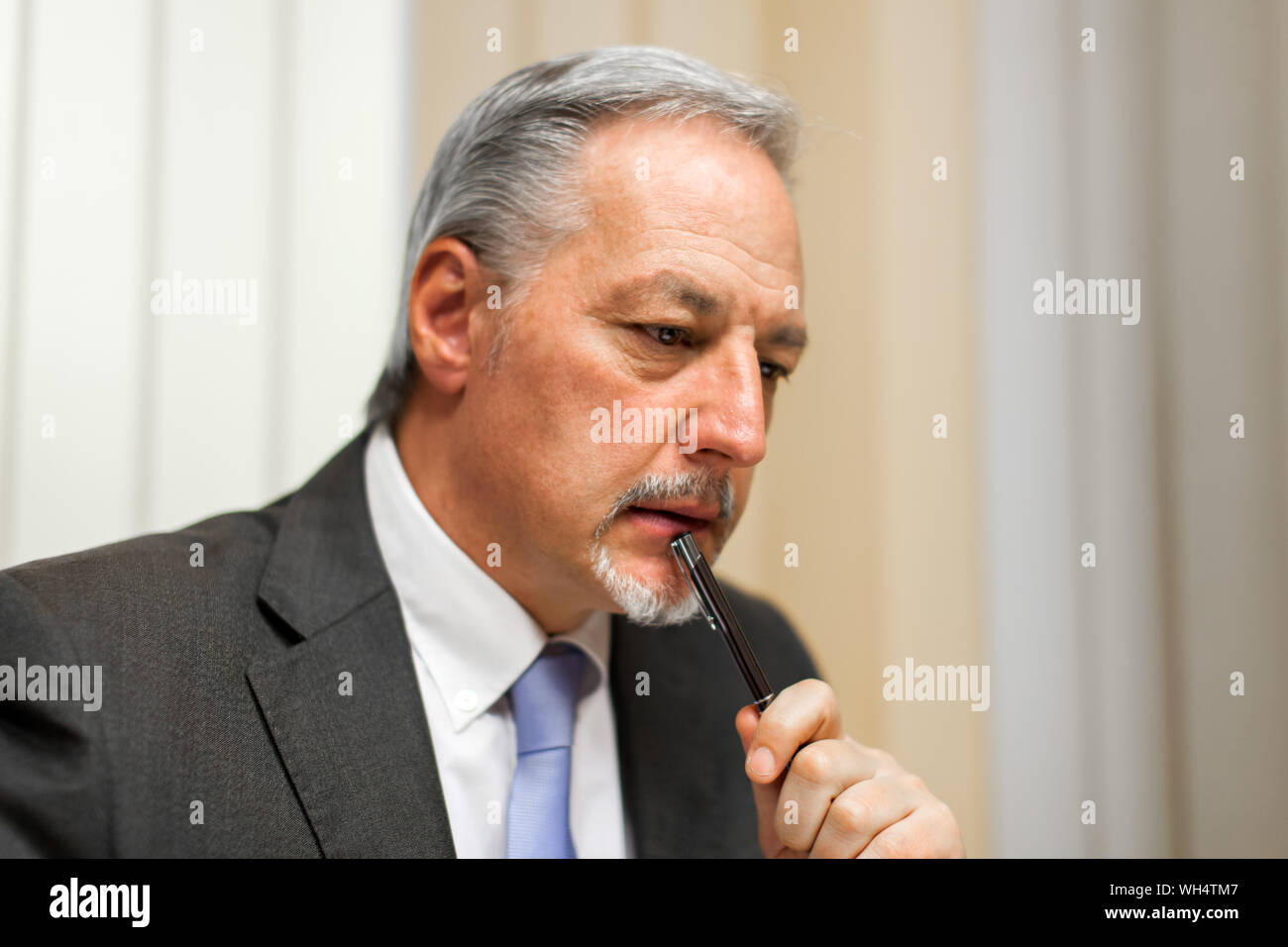 Skeptic businessman hi-res stock photography and images - Alamy