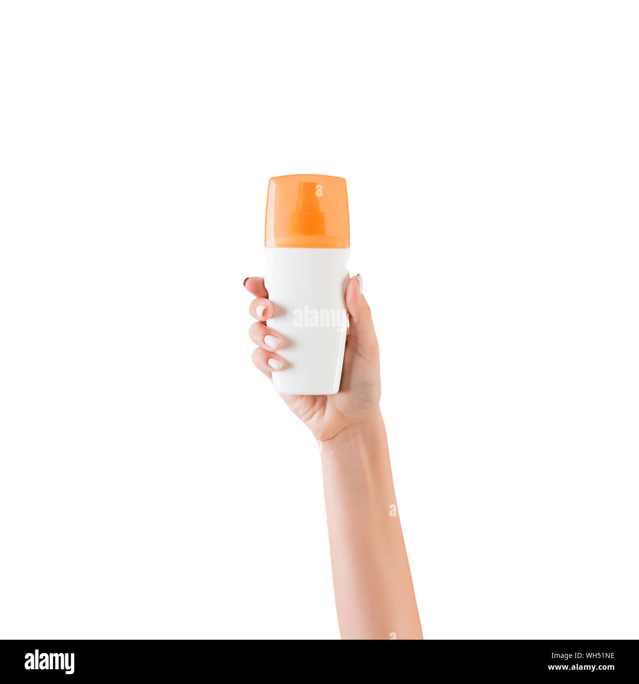 Female hand holding cream bottle of lotion isolated. Girl give cosmetic ...