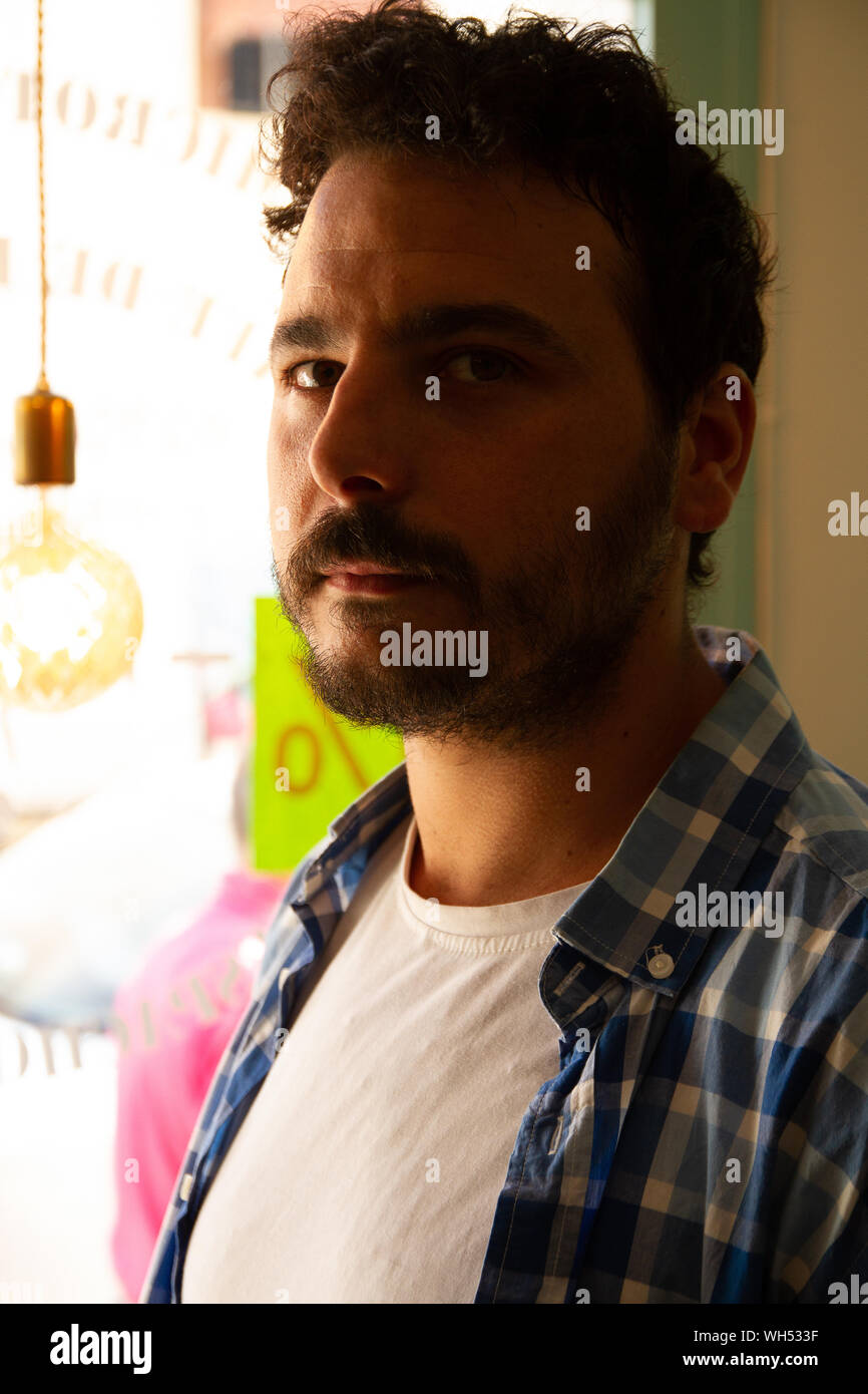 Man portrait pose natural light vertical hi-res stock photography and ...