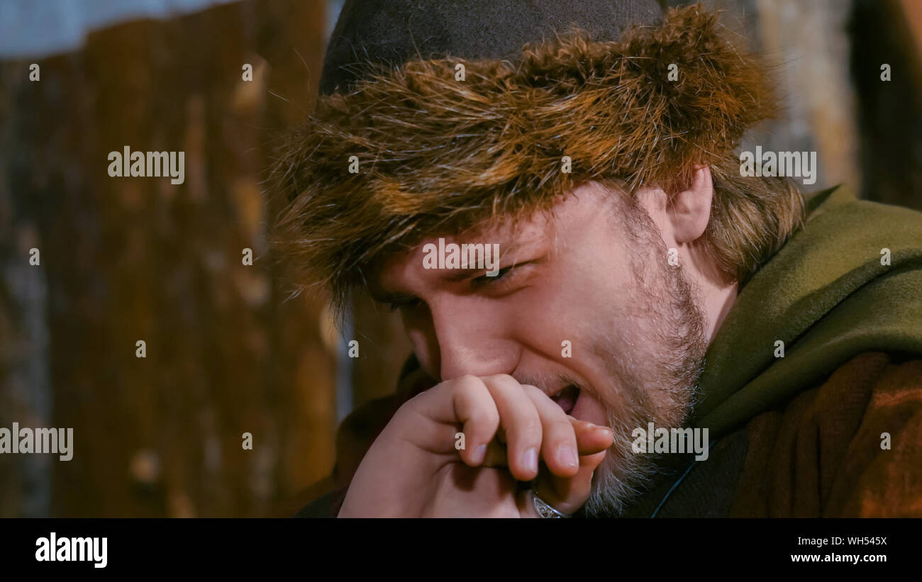 Portrait of sad man in russian ethnic suit playing chess Stock Photo ...