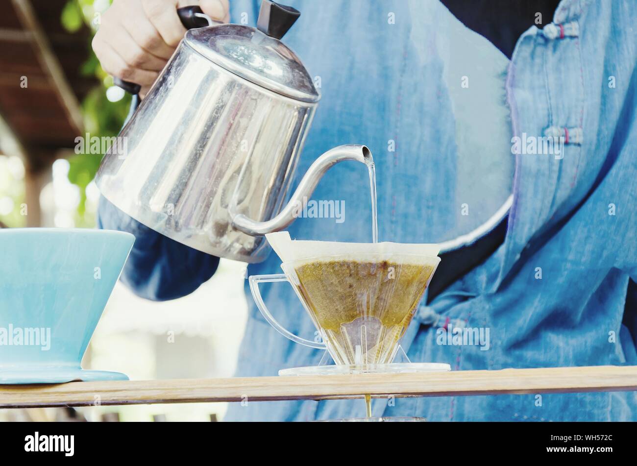 Man pouring glass of water hi-res stock photography and images - Alamy