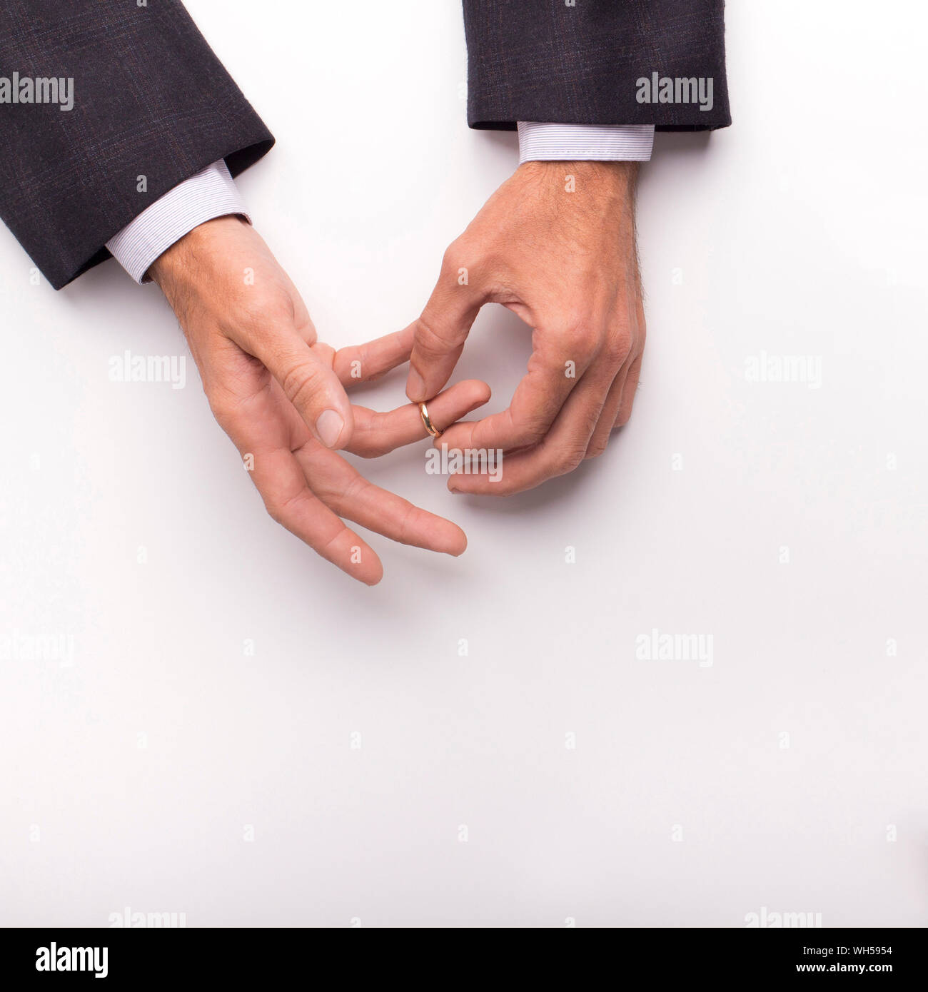 Man removing wedding ring hi-res stock photography and images - Alamy