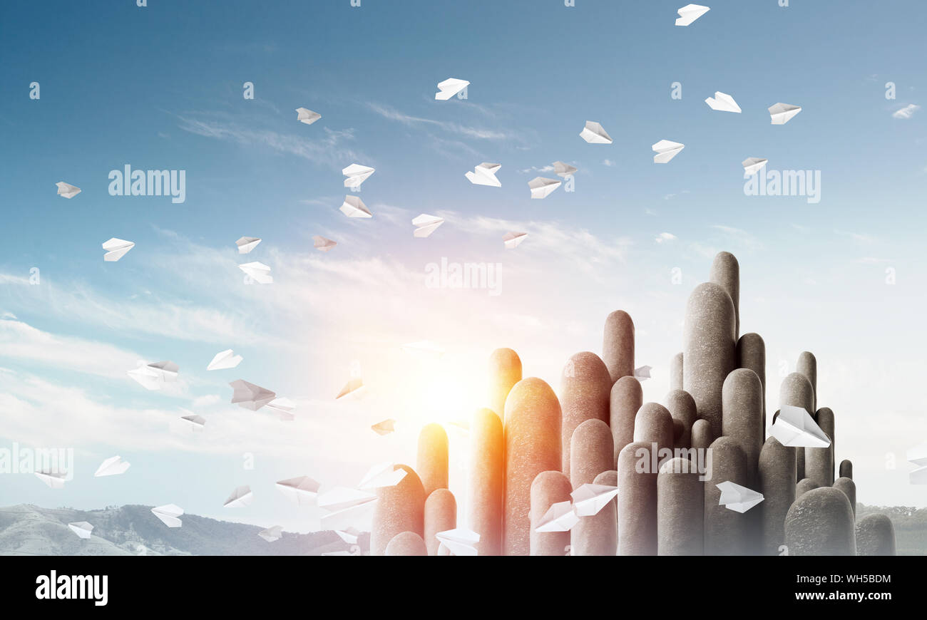 Image of high and huge stone columns located outdoors among flying ...