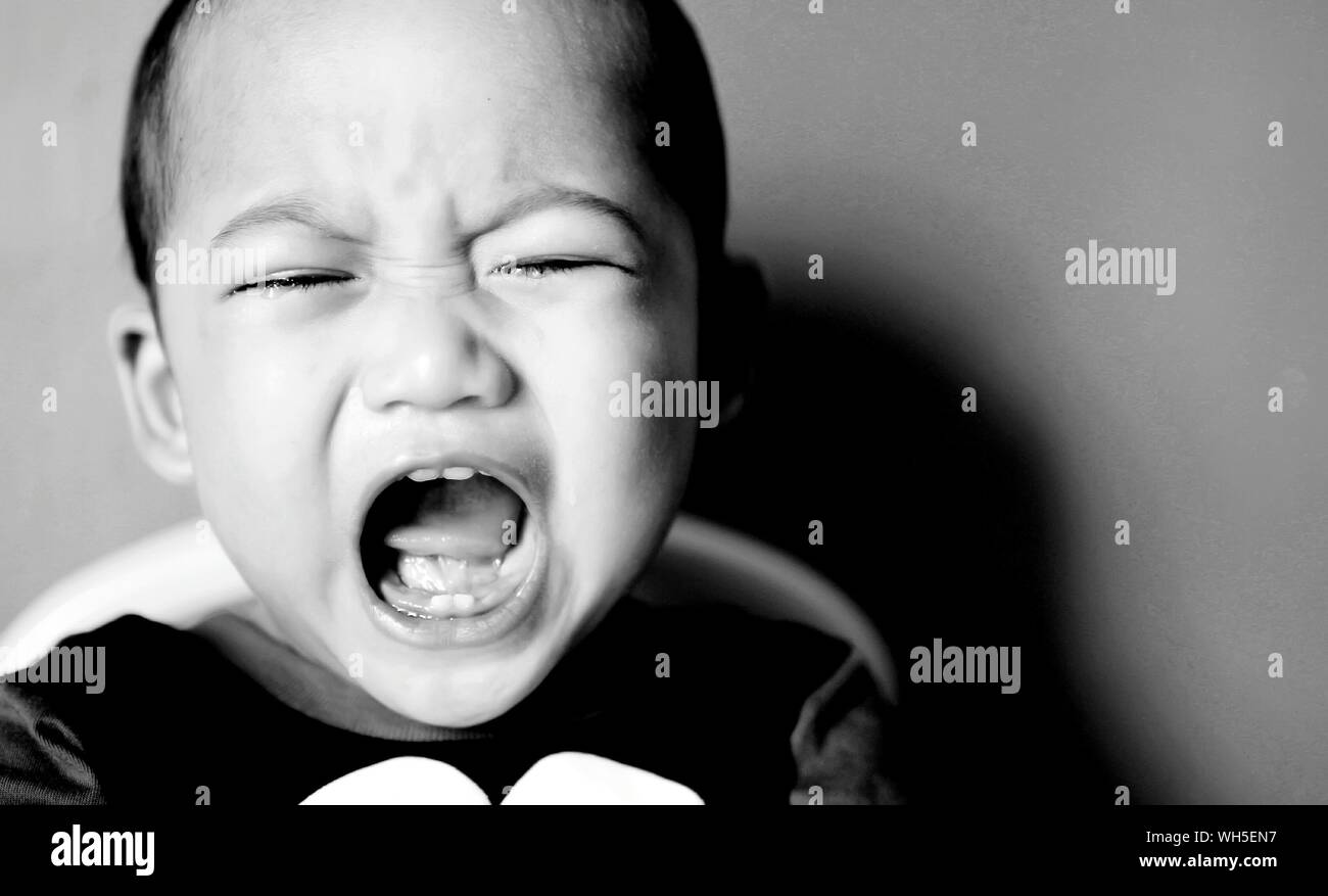 Indian baby crying hi-res stock photography and images - Alamy