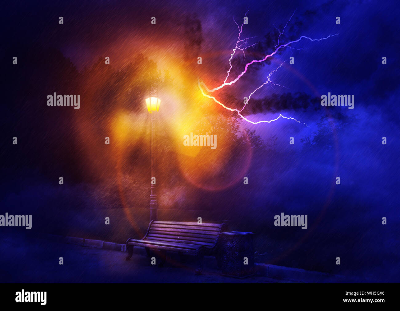 Dark rainy night scene with street lantern glowing orange lights Stock ...