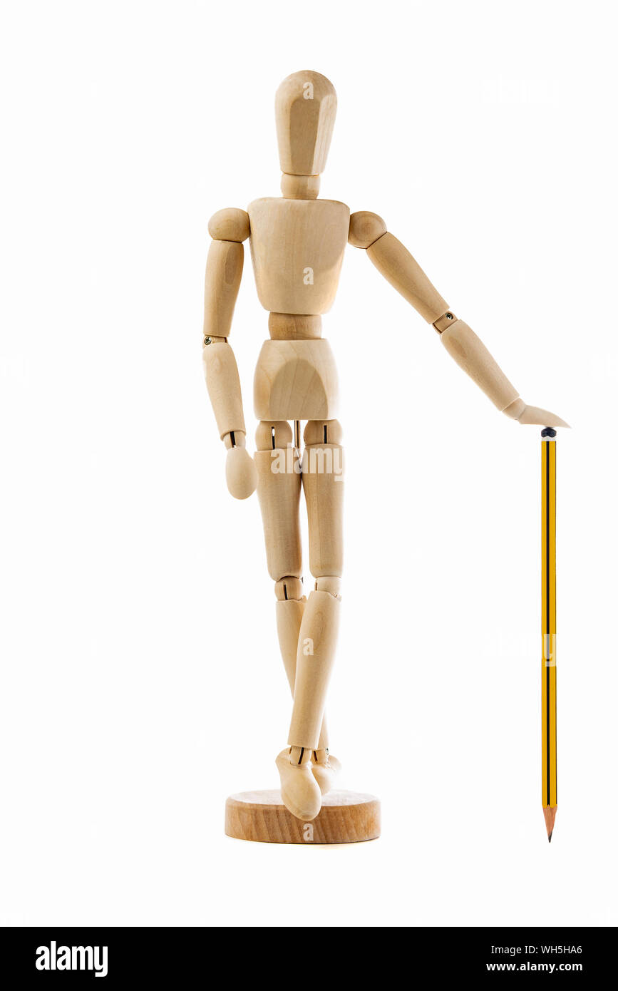 Small wood mannequin standing with colour pencil isolated on white ...