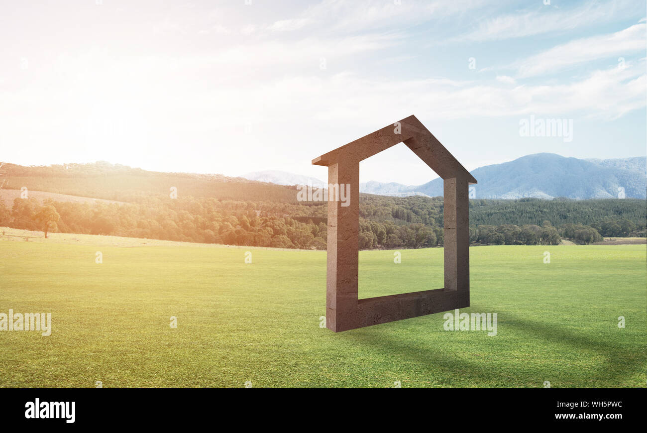 House stone figure as symbol of real estate outdoors against natural ...