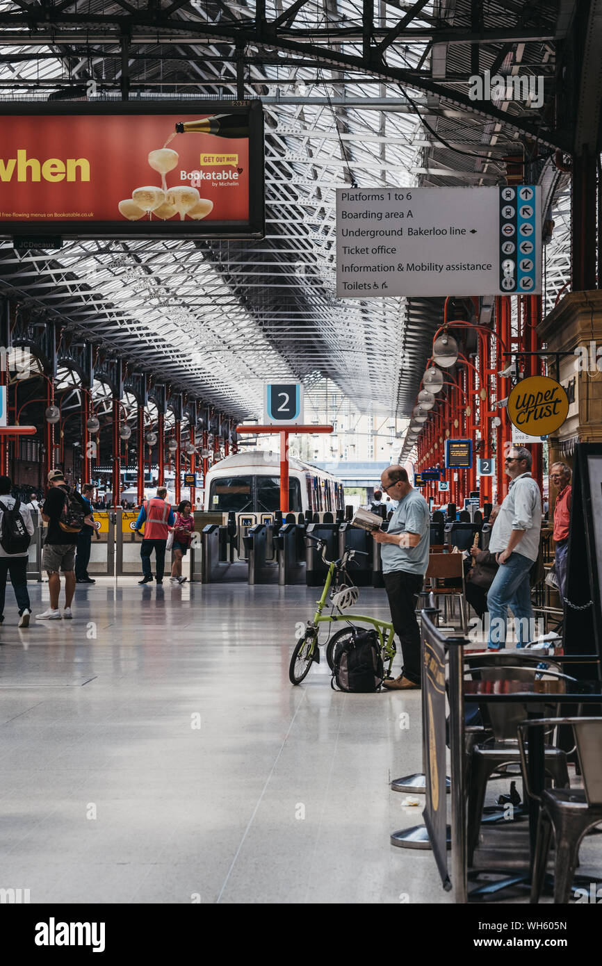 London, UK - July 18, 2019: People inside Marylebone Station in London ...