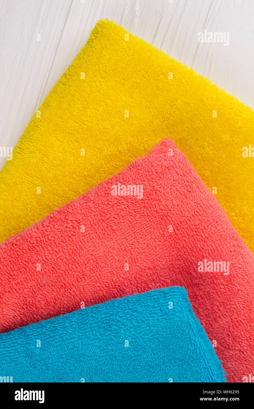 Set of colorful bath towels, top view Stock Photo - Alamy