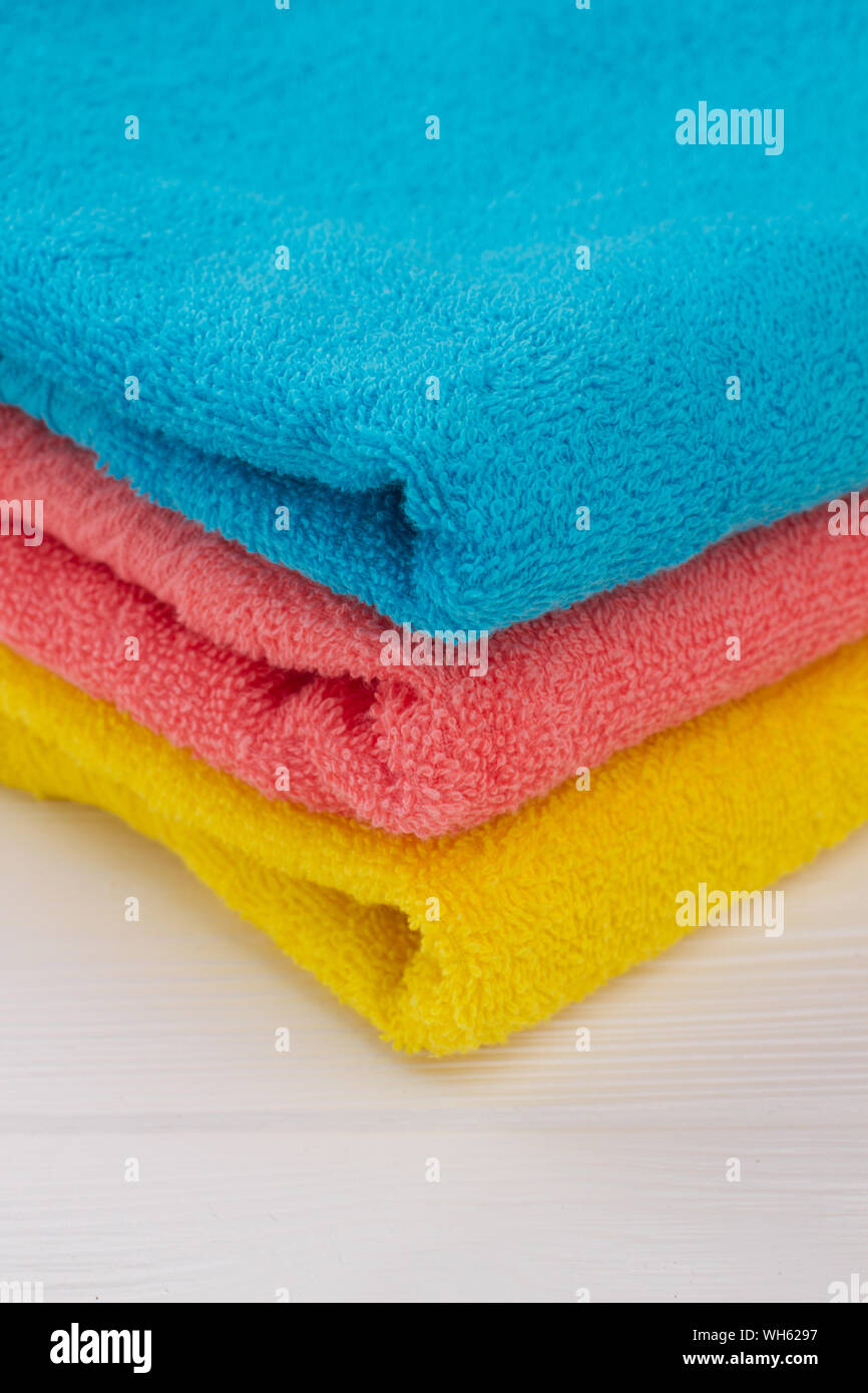 Stack orange yellow towels hi-res stock photography and images - Alamy