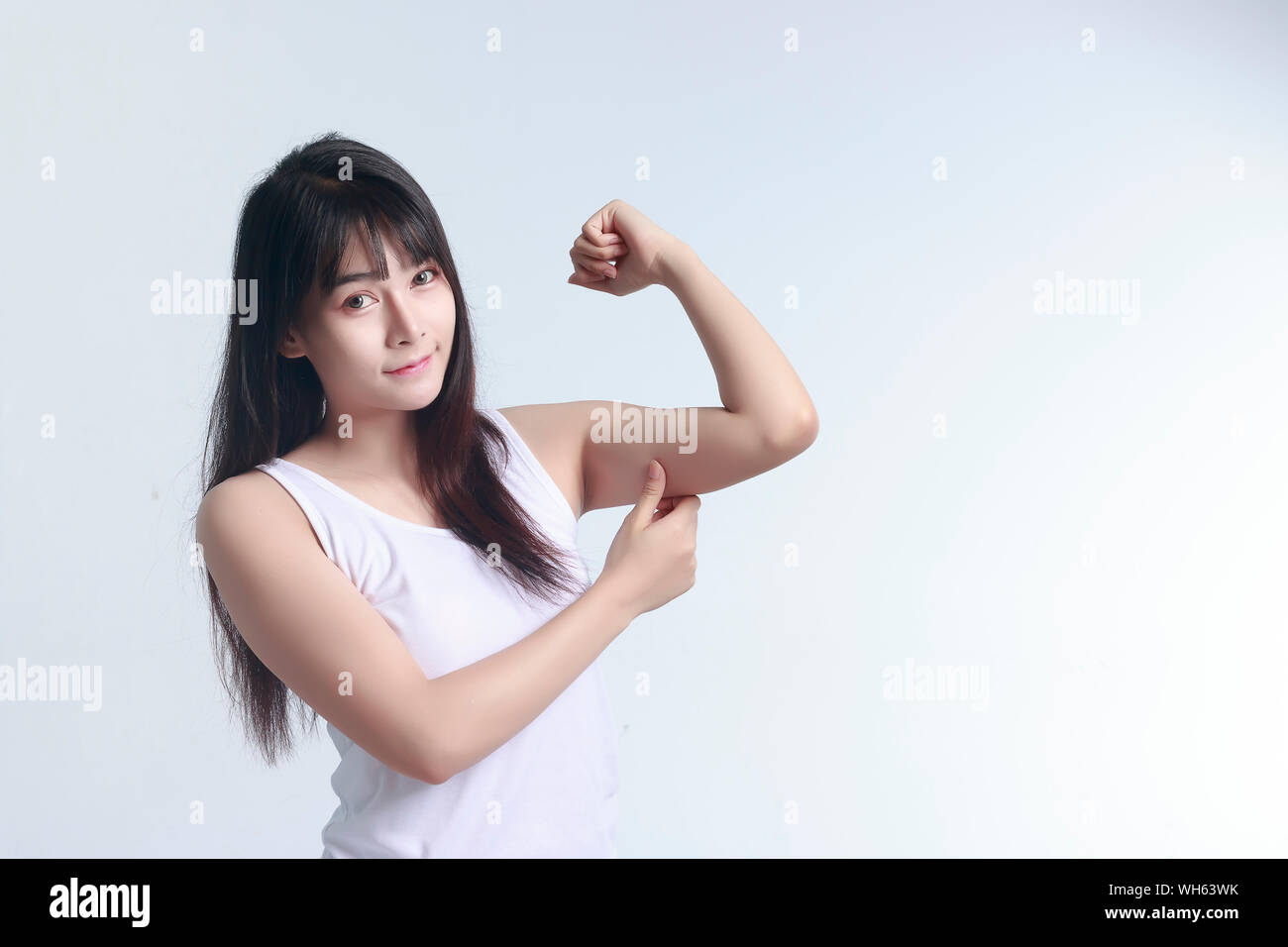 Woman touching arm her hi-res stock photography and images - Alamy