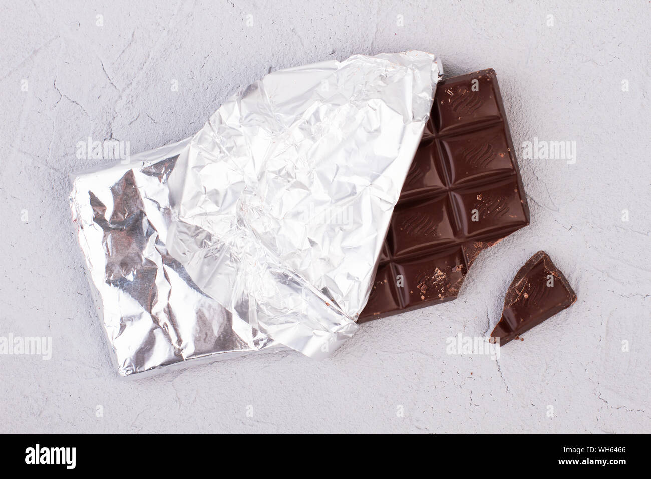 Broken chocolate in wrapper hi-res stock photography and images - Alamy