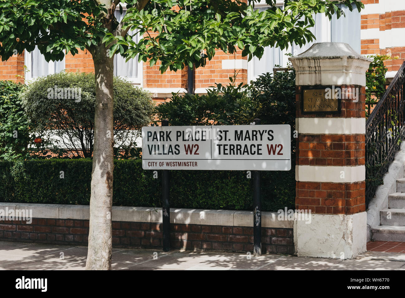 London, UK - July 18, 2019: Street name signs Park Place Villas and St ...