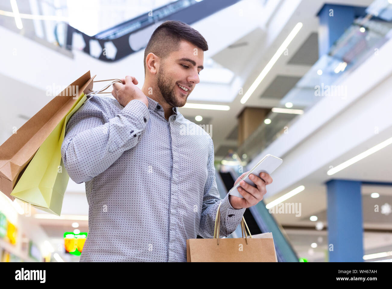 Black man purchasing technology hi-res stock photography and images - Alamy