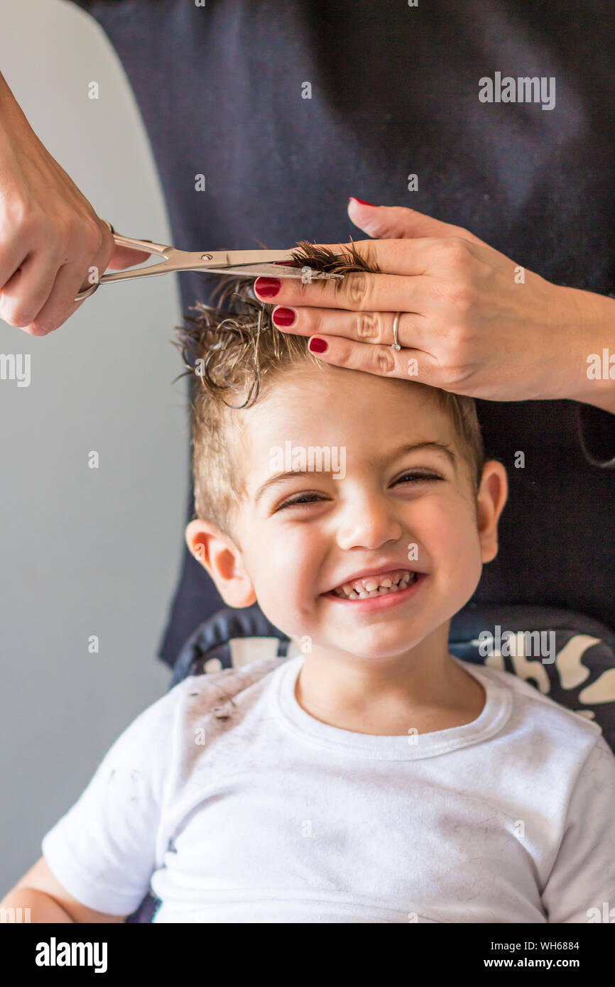 Boys haircut hi-res stock photography and images - Alamy
