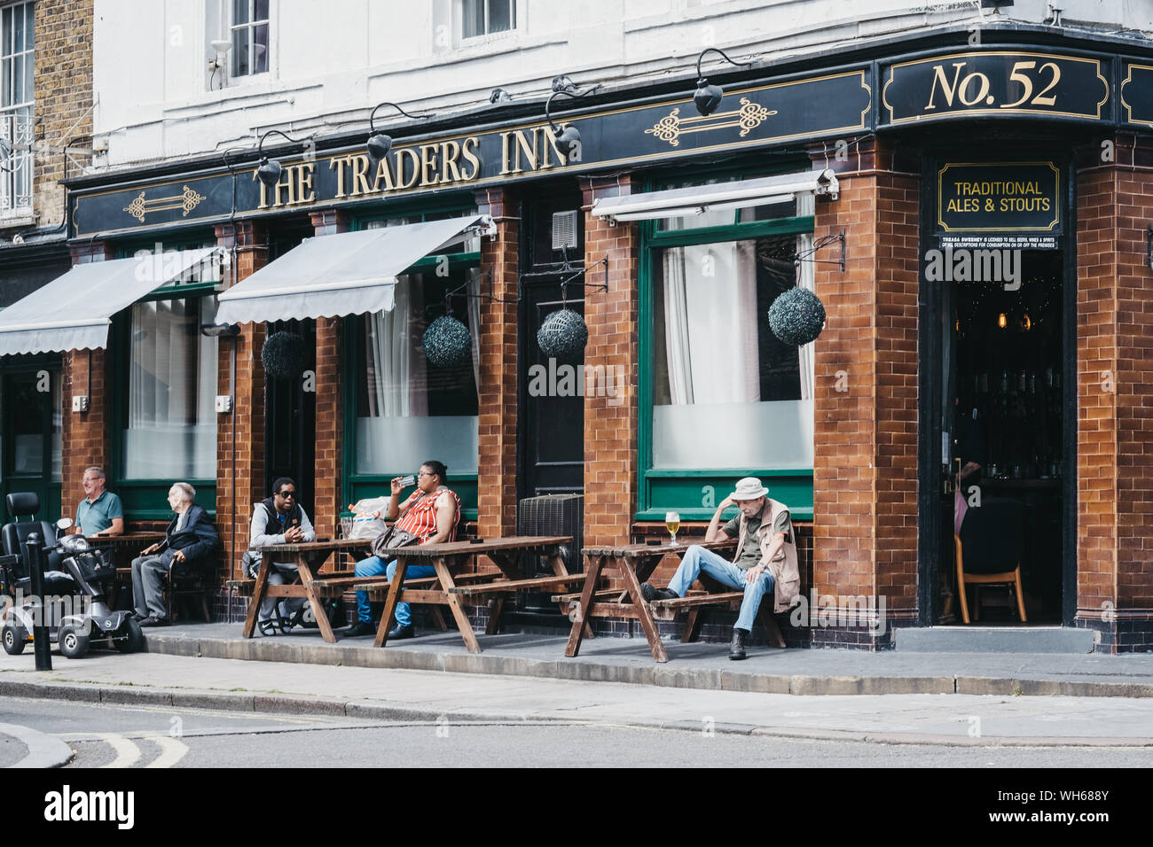 London, UK - July 18, 2019: People sitting at the outdoor tables of The ...