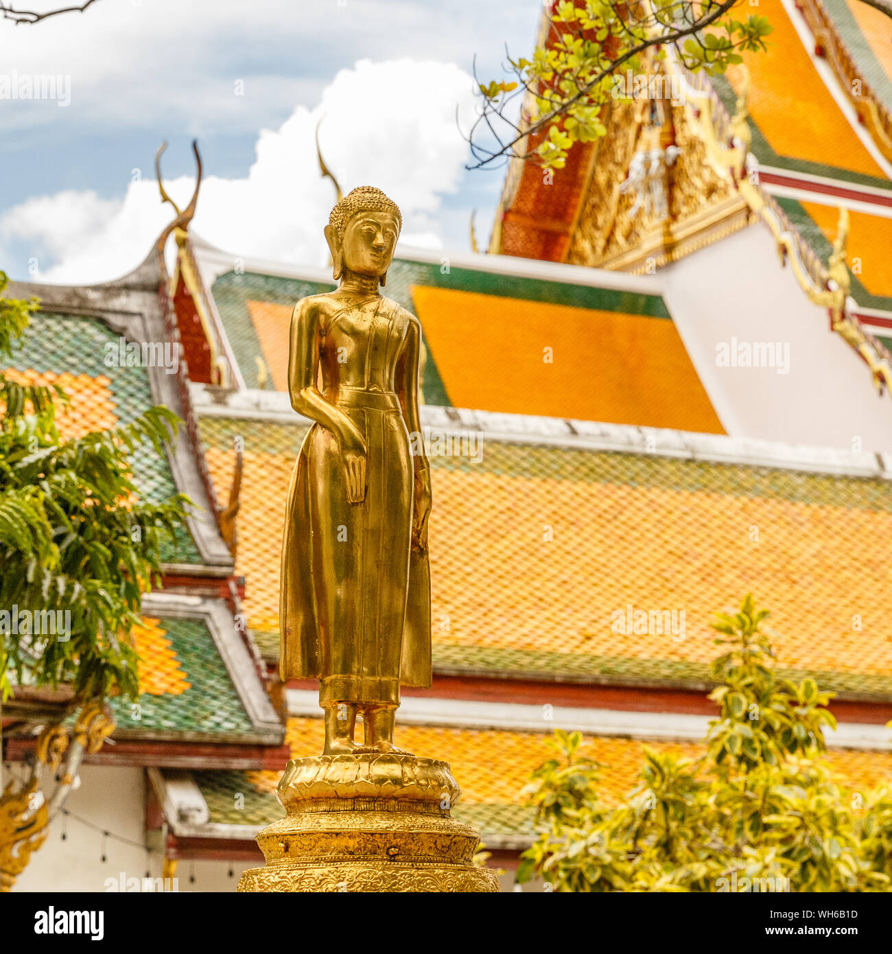 Golden statue at Wat Suthat Thepwararam, old royal Buddhist temple (wat ...