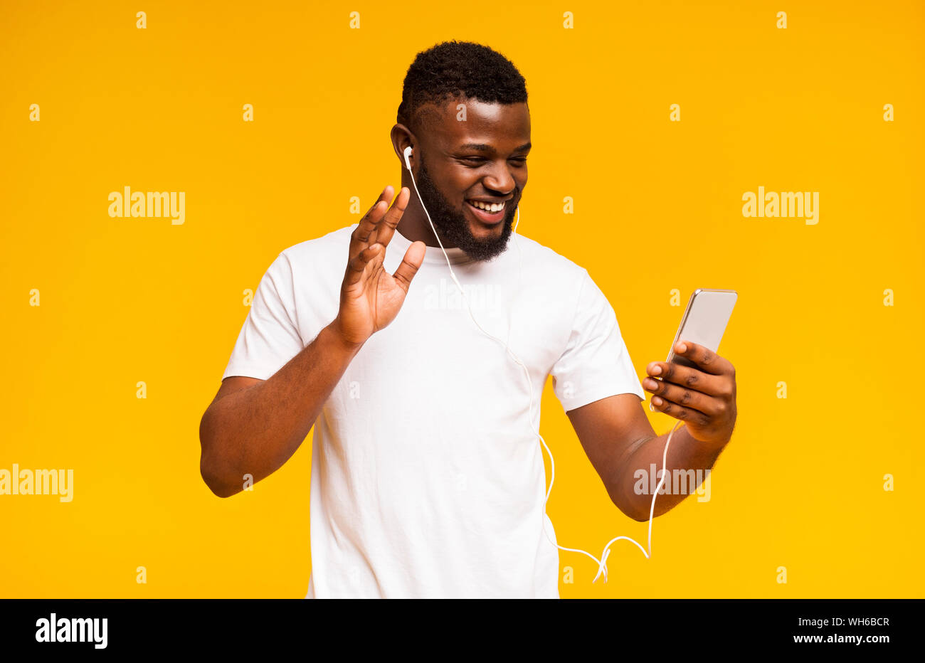 Cheerful black man making hi-res stock photography and images - Alamy