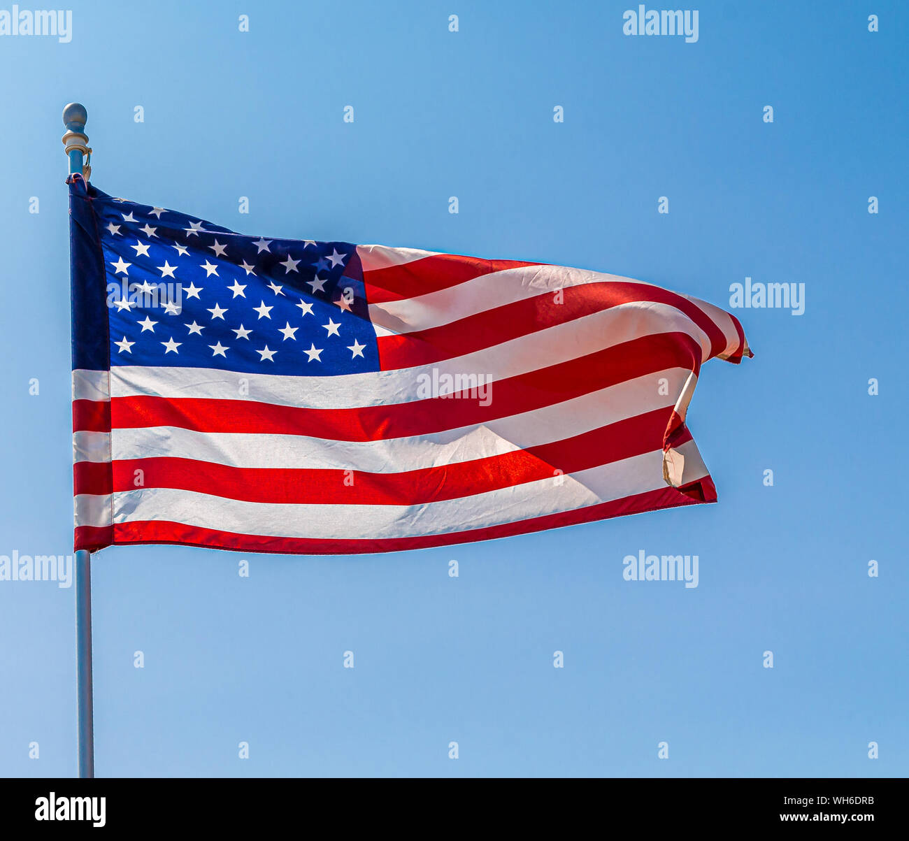 Flag unfurling hi-res stock photography and images - Alamy