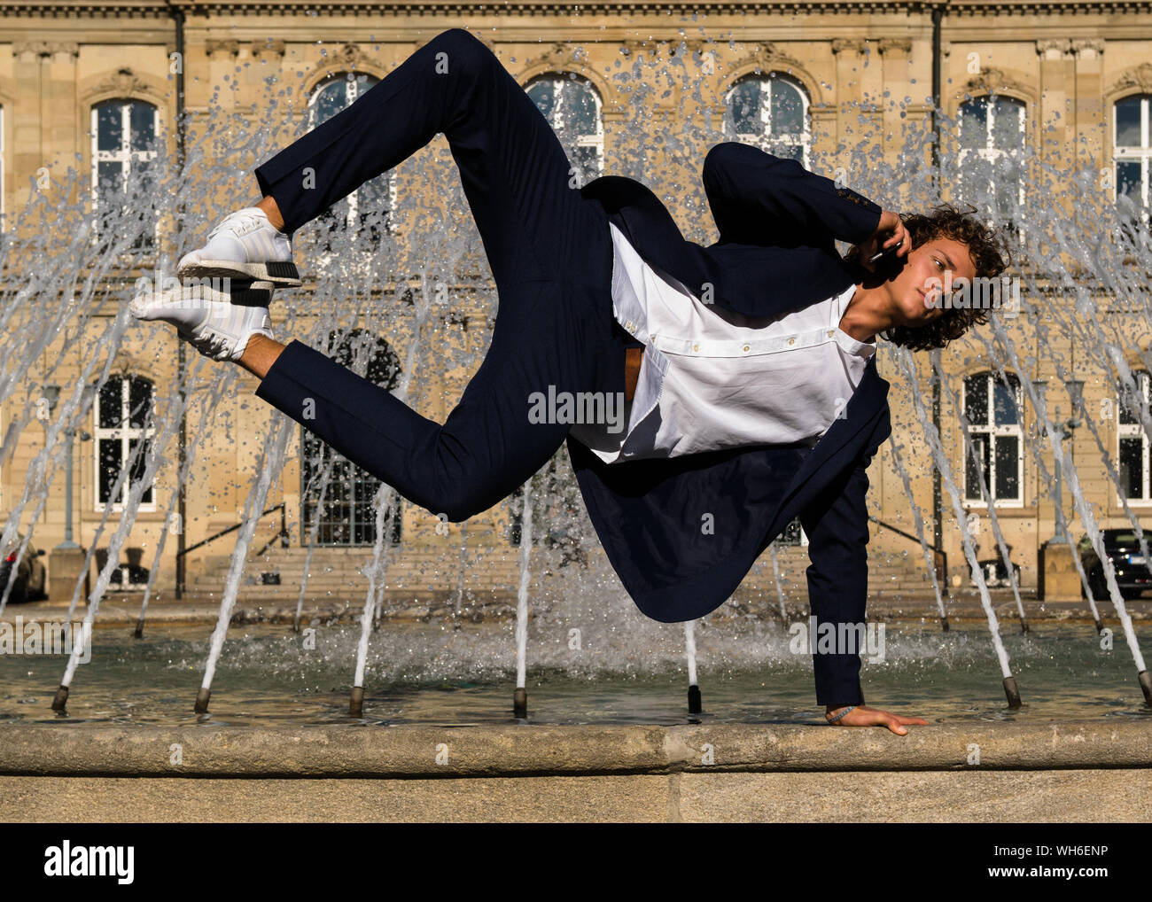 Jumping into the fountain hi-res stock photography and images - Alamy