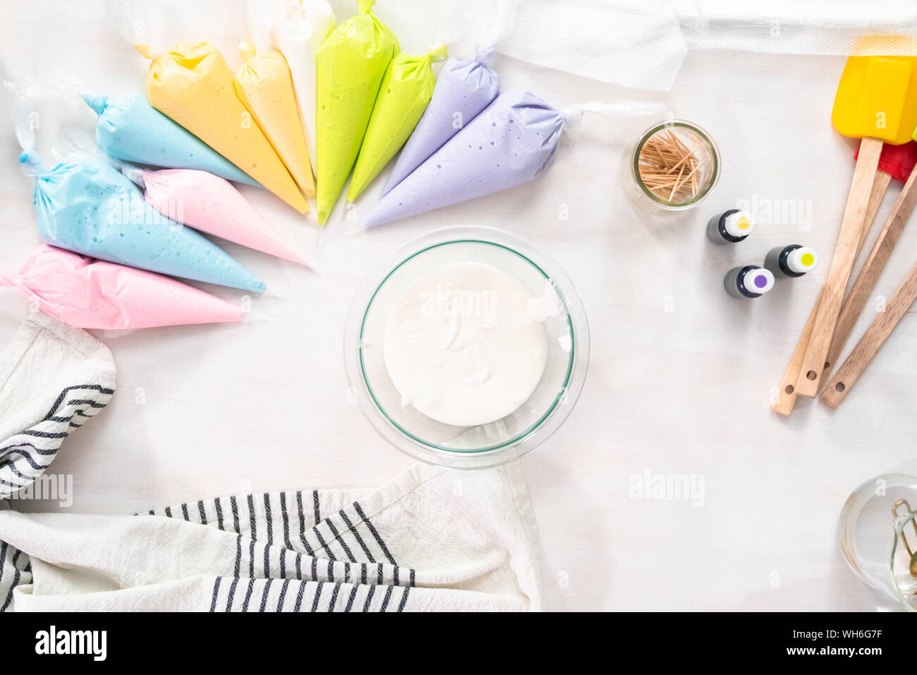 Flat lay. Making royal icing to decorate Easter sugar cookies Stock ...