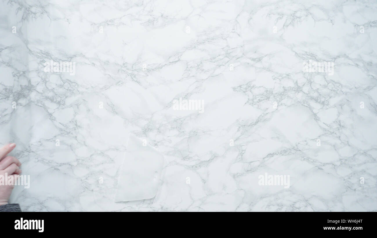 Flat lay. Making marble board with adhesive paper for food photography ...