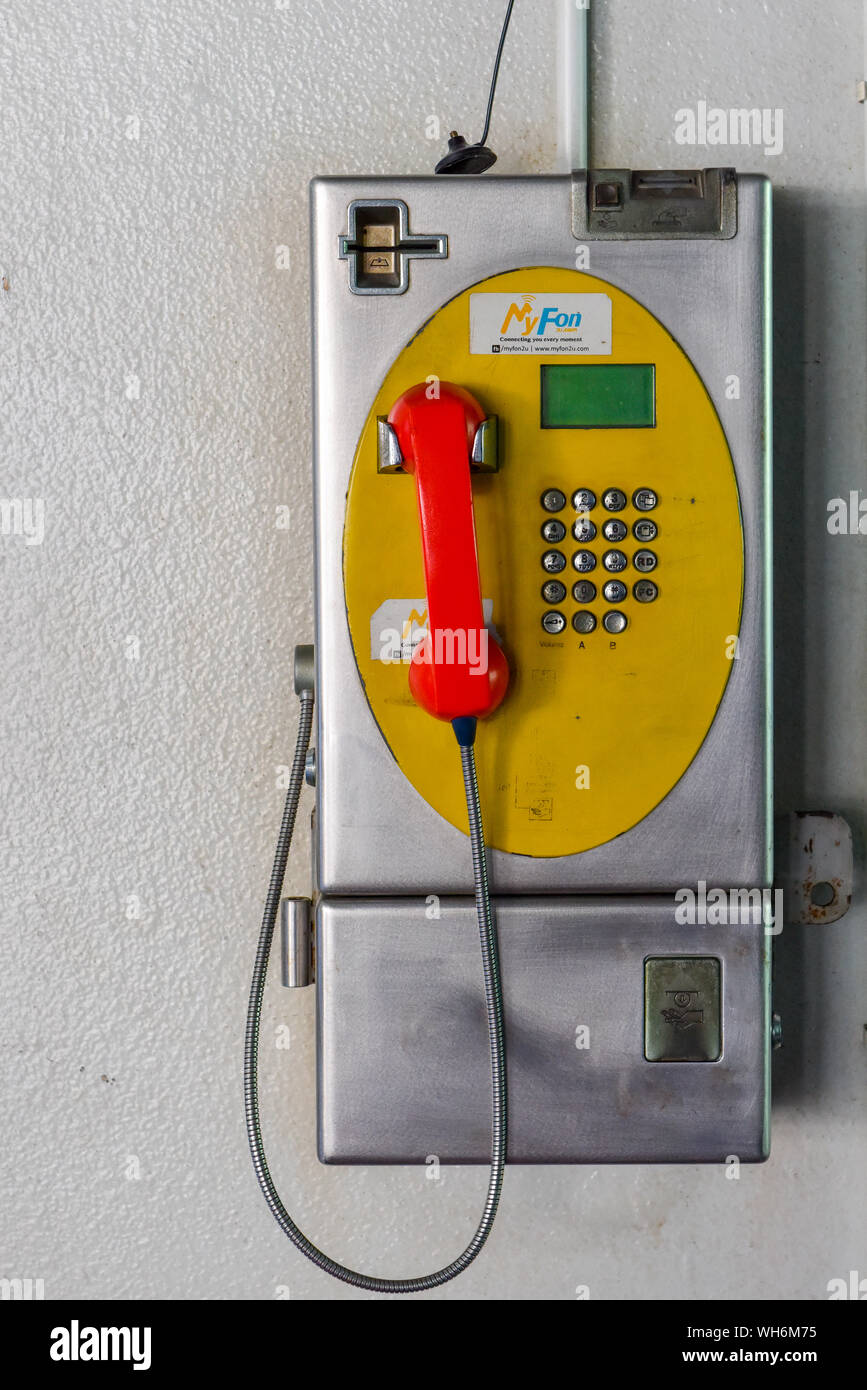 Old public phone, Kuala Lumpur Stock Photo - Alamy