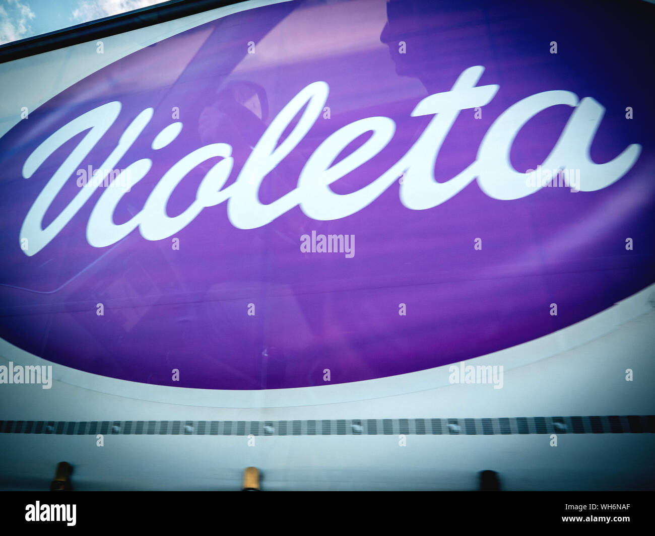 Cologne, Germany - Aug 29, 2019: Reflection of female driver and ...