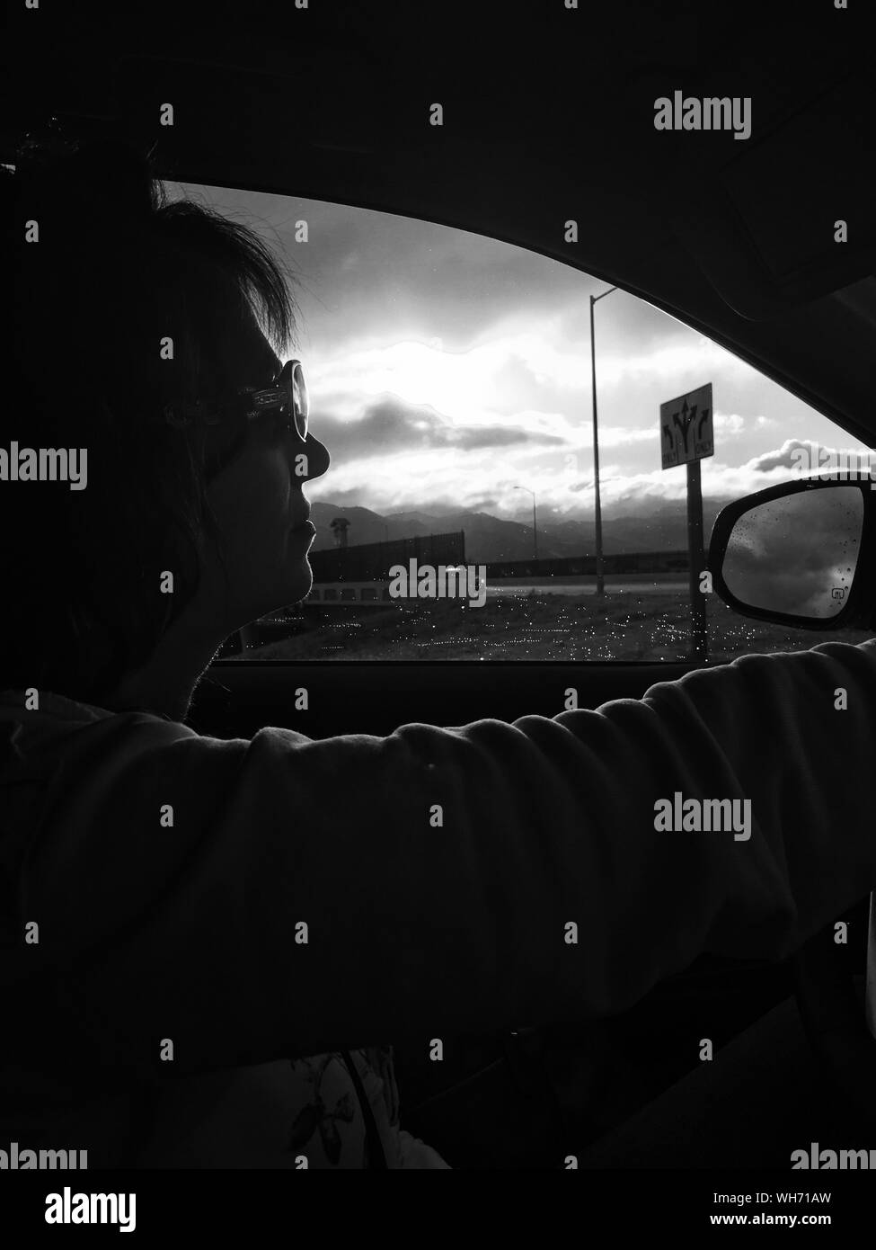 Side view woman driving car hi-res stock photography and images - Alamy