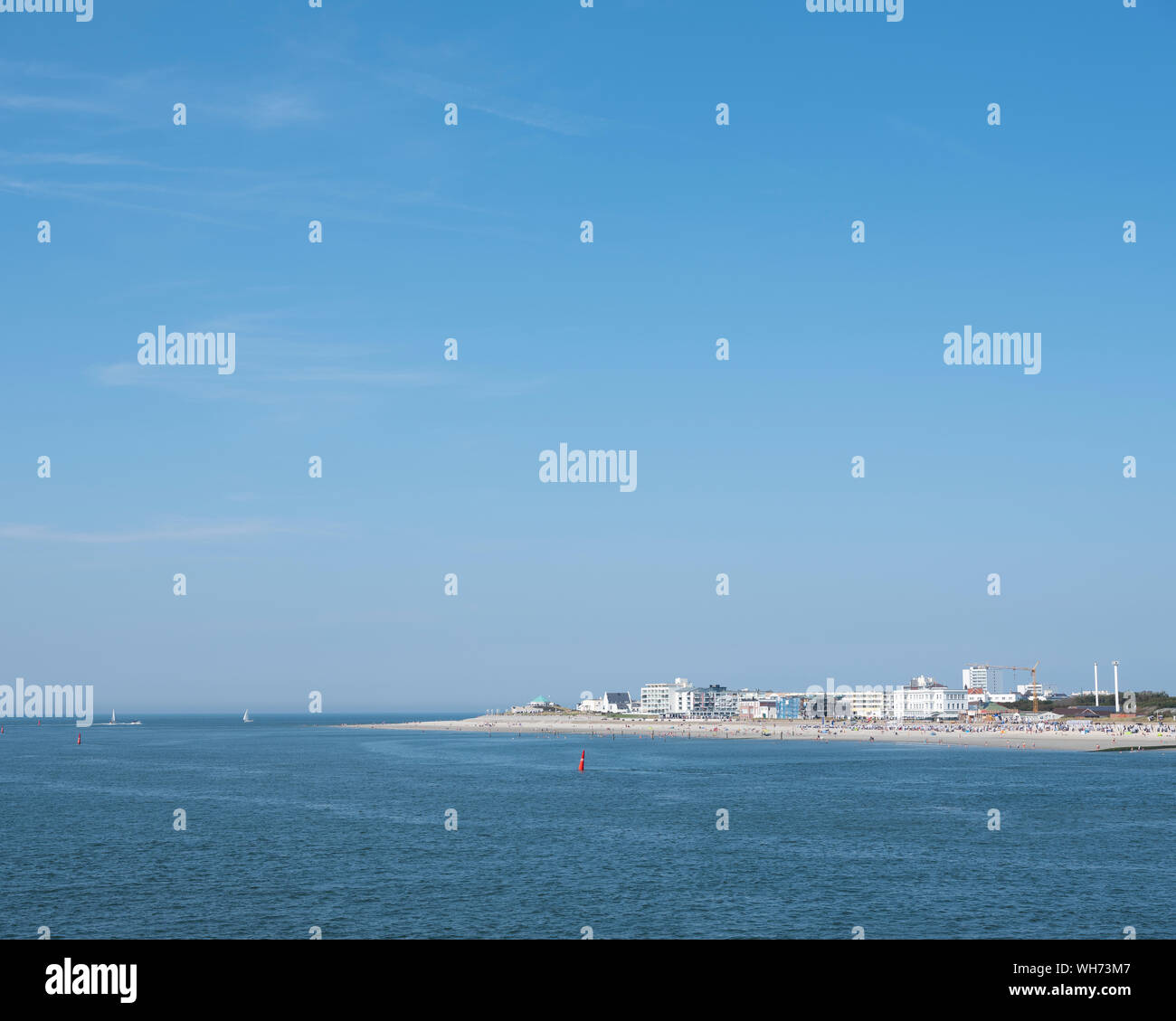 town and beach of german island norderney seen from ferry to mainland ...