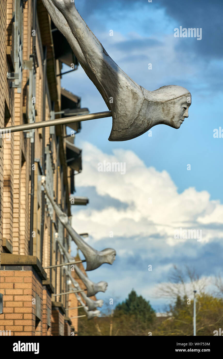 The Attendant head sculpture hanging over the doorways to modern ...