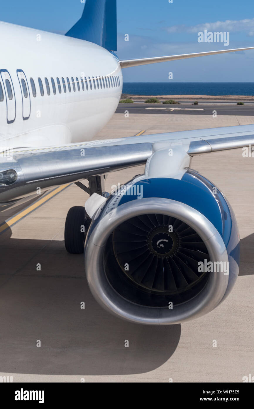 Passenger jet engine on an aircraft at airport Stock Photo - Alamy