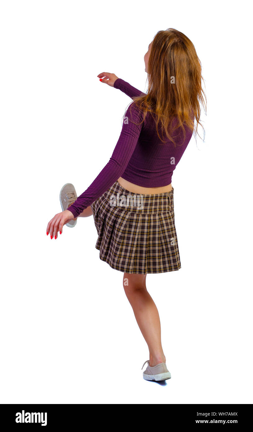 Back view of the falling girl. the girl slipped. Rear view people ...