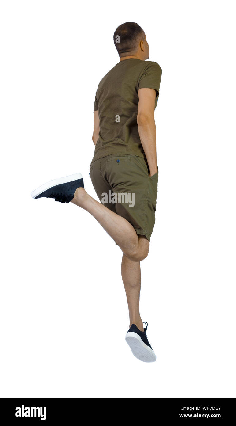 Back view of man in zero gravity or a fall. guy is flying, falling or ...